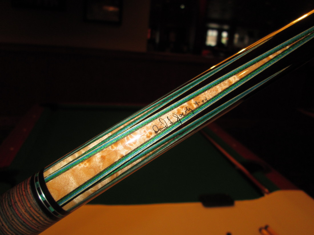 David Jacoby cue with custom joint protectors & stacked leather wrap.
